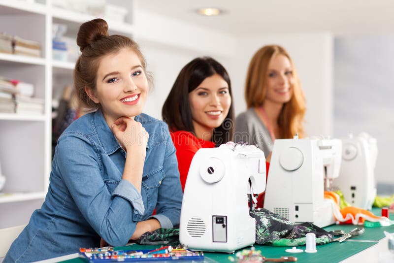 Women in a sewing workshop stock photo. Image of creative - 65241038