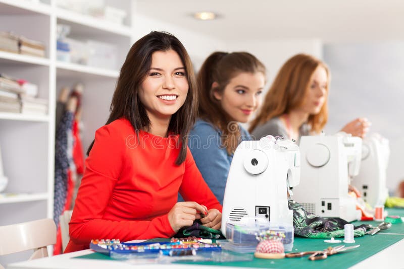 Women in a sewing workshop stock image. Image of beautiful - 65241075