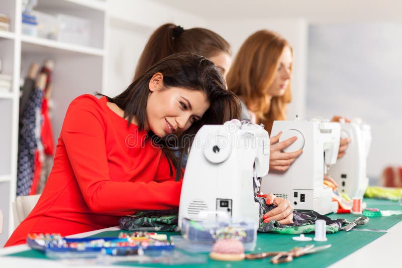 Women in a sewing workshop stock image. Image of lesson - 65677187