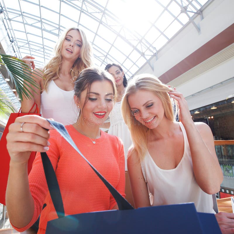 Women shopping at mall stock image. Image of sale, brunette - 65914267