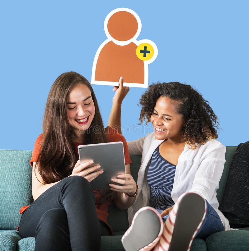 Women Showing a Friend Request Icon and Using a Tablet Stock Photo ...