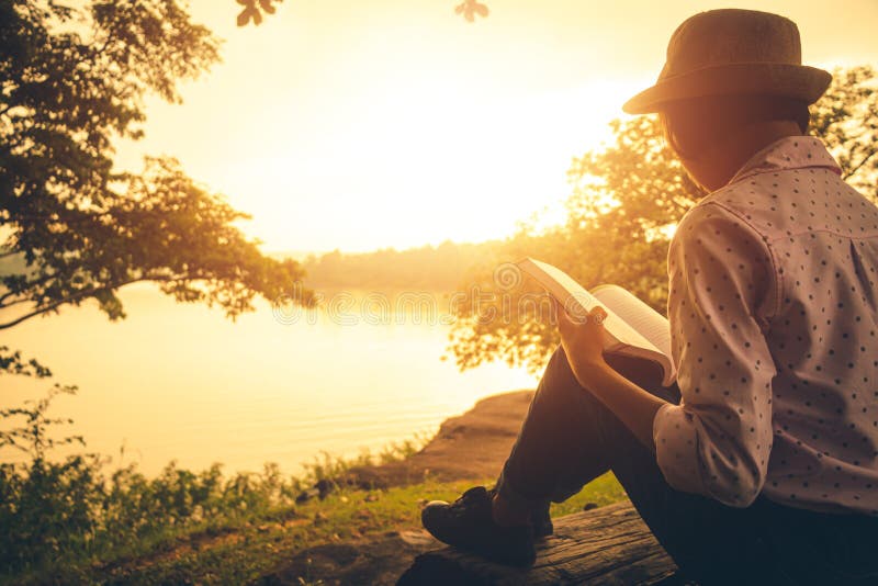 Women Read Book In The Holiday In Quiet Nature, Concept Reading A Book ...