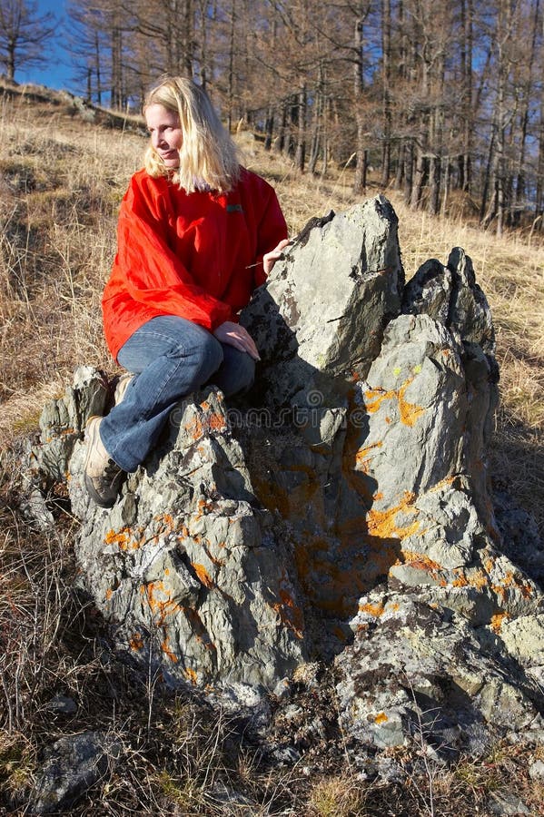 The Women Sits On A Stone. Picture Image: 1891909