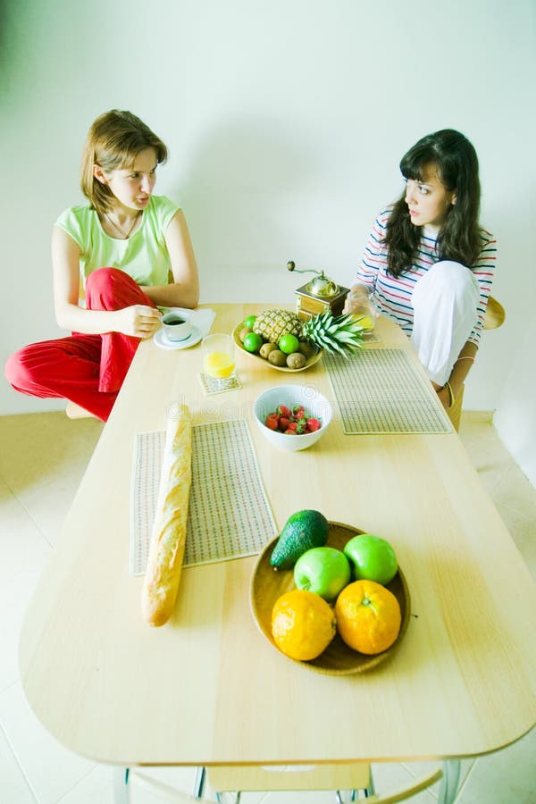 Women sitting at table stock image. Image of eating, talk - 2712653