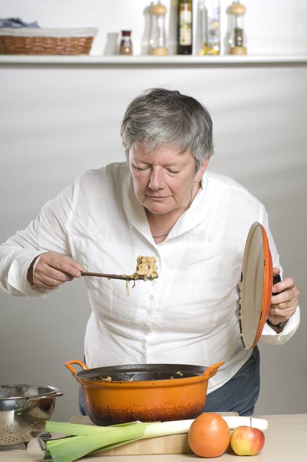 Women is smelling the food stock image. Image of orange - 17003133