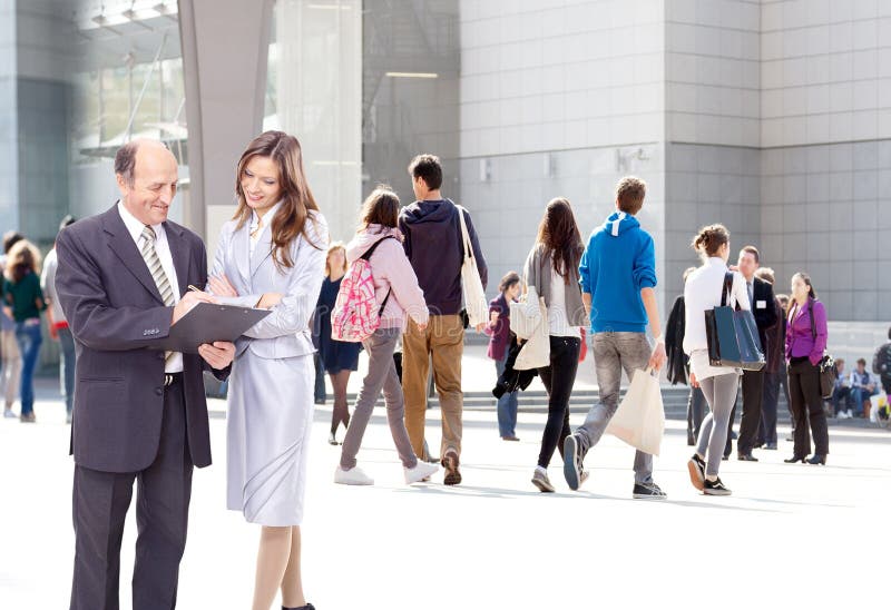 Women Standing in Front of People Stock Image - Image of family, office ...