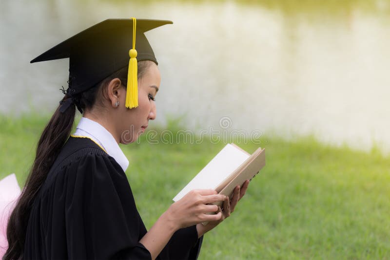 Women Student Graduate Reading Book Stock Photo - Image of asian, crowd ...
