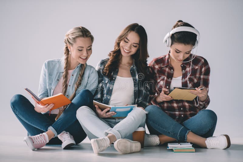 Women Students with Textbooks Studying Together Stock Photo - Image of ...