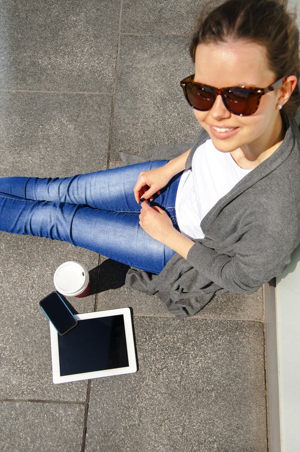 Women with Tablet Computer and Phone on the Street Stock Photo - Image ...