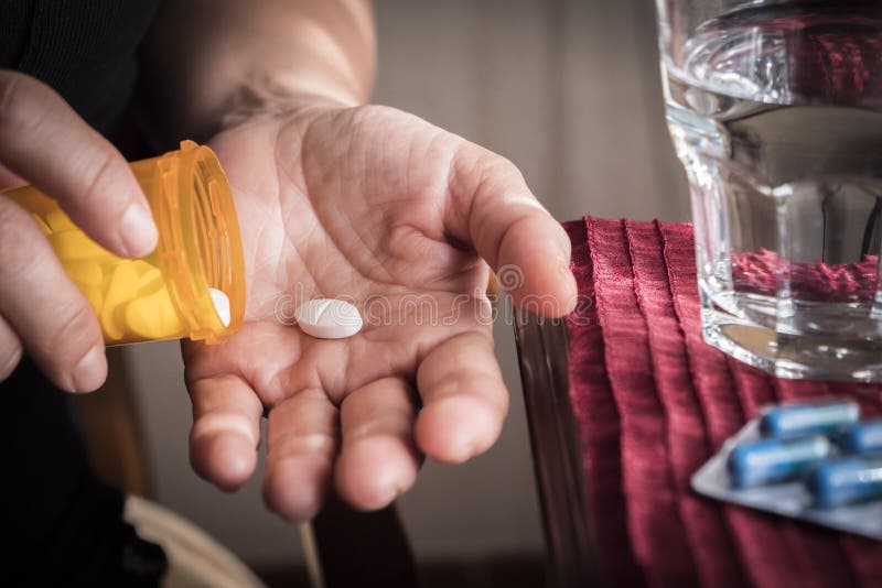 Women Take White Capsule with Right Hand Stock Image - Image of ...