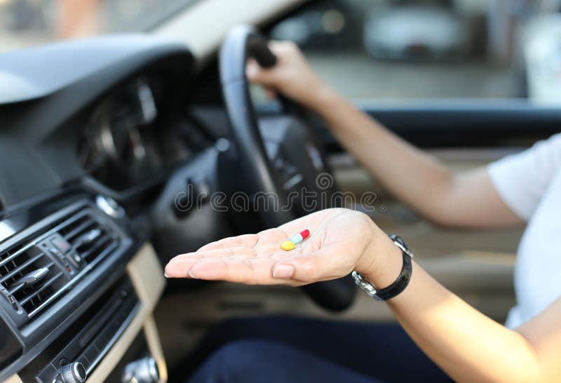 Man Taking Drugs before Driving Stock Image - Image of drugged, tablets ...