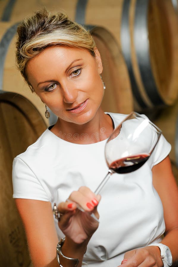 Women Tasting Wine in a Cellar-Winemaker Stock Photo - Image of looking ...