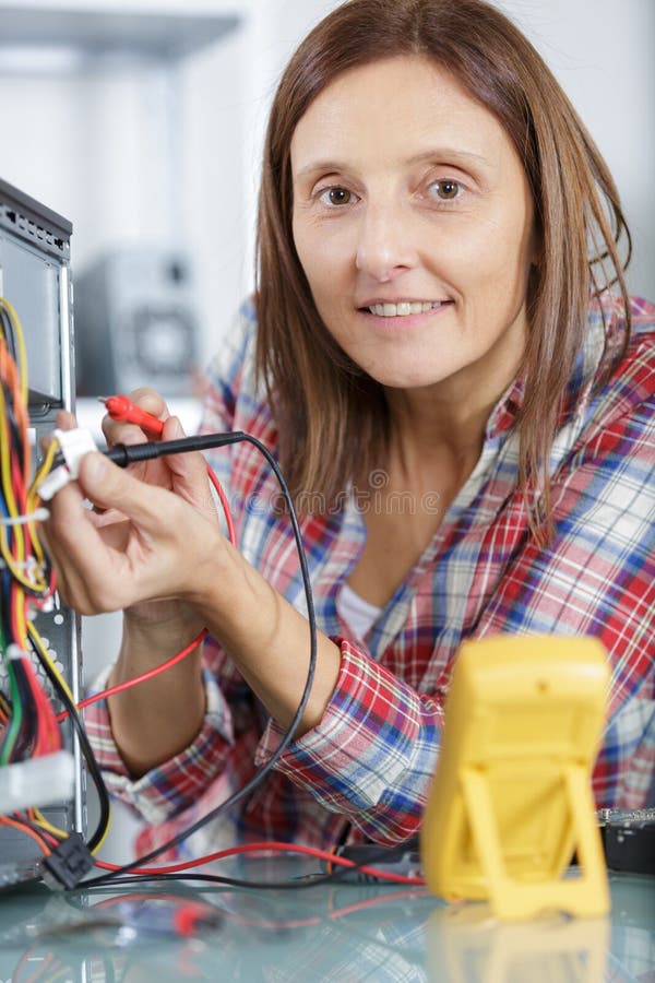 Women Technician Looking at Camera Stock Photo - Image of engineering ...