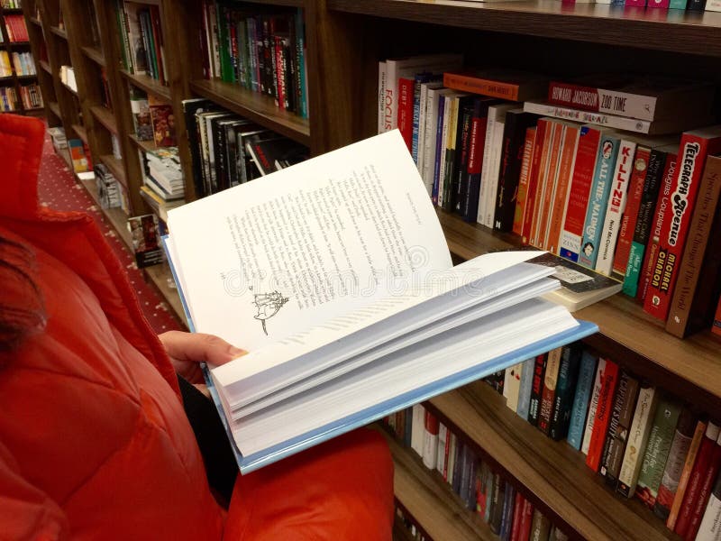Women with Unfold Book in a Bookstore Editorial Image - Image of shop ...