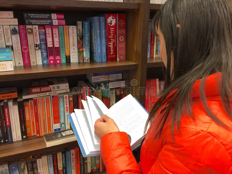 Women with Unfold Book in a Bookstore Editorial Stock Photo - Image of ...