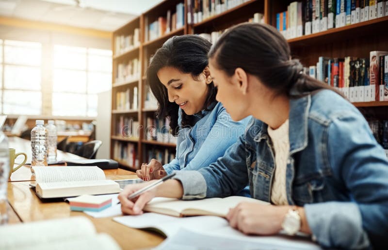 Women, University Student and Group Work at Library with Textbook for ...