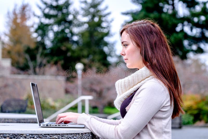 Women at University Typing on a Computer Stock Photo - Image of ...
