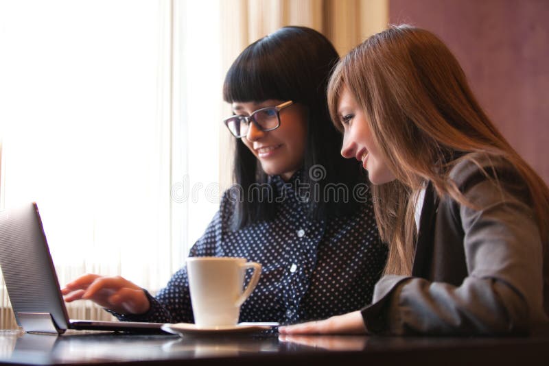Women use netbook stock image. Image of sight, beautiful - 23578181