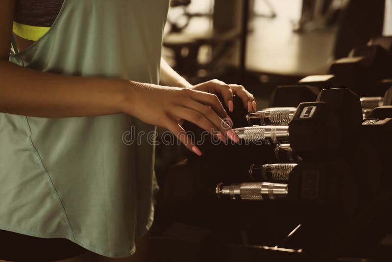 Women Using Dumbbell in Gym Stock Photo - Image of female, biceps ...