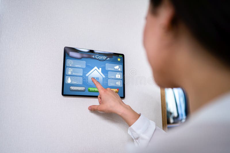 Women Using Home Automation and Camera Control System Stock Photo ...