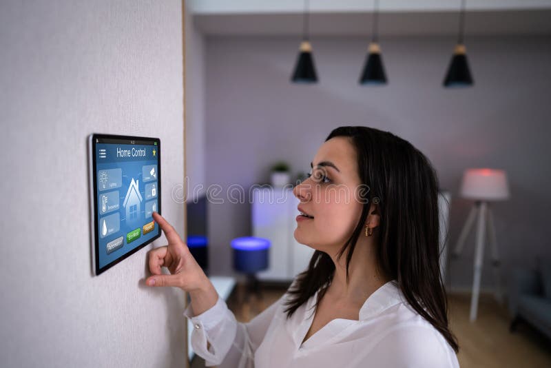 Women Using Home Automation and Camera Control System Stock Image ...