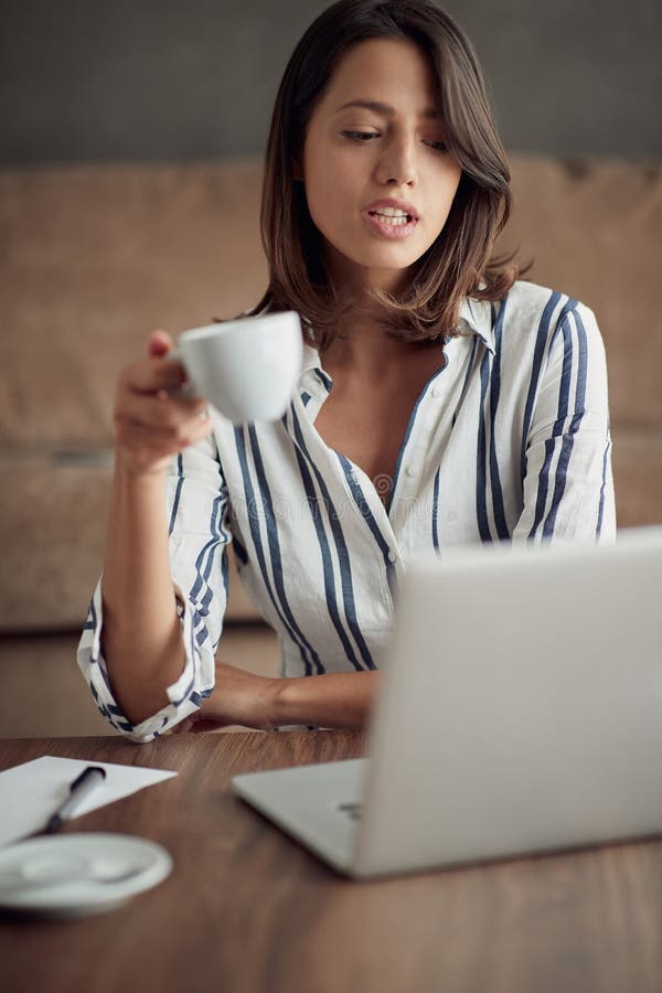 Women Using Laptop Computer and Drinking Coffee Stock Image - Image of ...