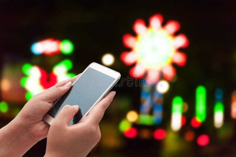 The Women Using Smart Phone on Blurred Light Street Stock Image - Image ...