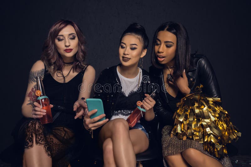 Women Using Smartphone Together during Party Stock Photo - Image of ...