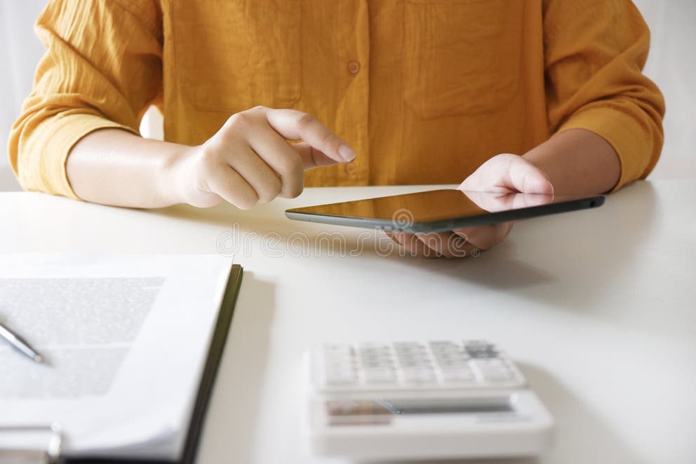 Women Using Tablet while Working in Her Office. Stock Image - Image of ...