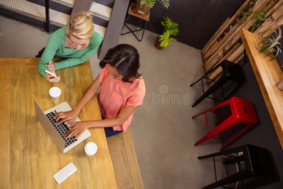 Women using technology stock photo. Image of caucasian - 77689346