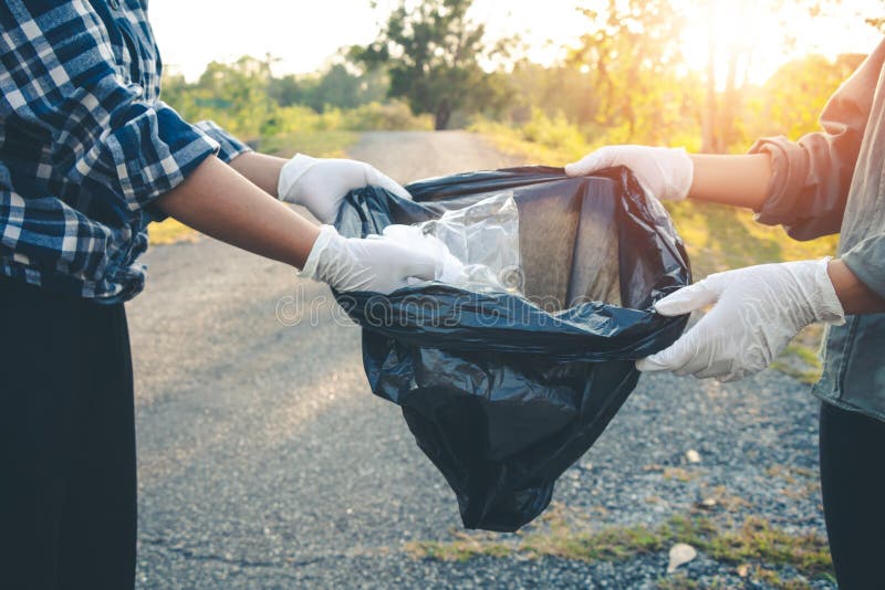 Women Volunteer Help Garbage Collection Charity. Stock Photo - Image of ...