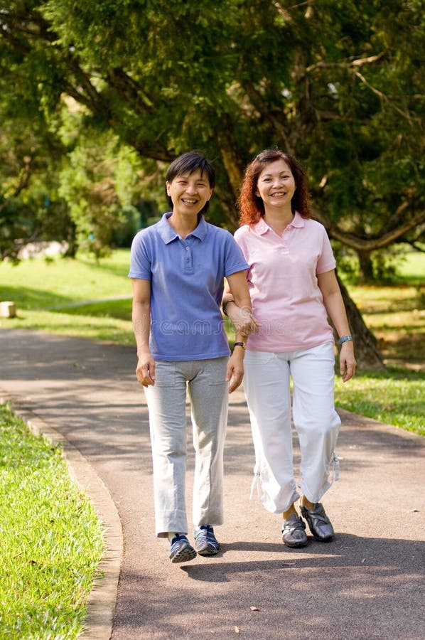 Women Walking Outside stock photo. Image of exercise, sunshine - 3071774