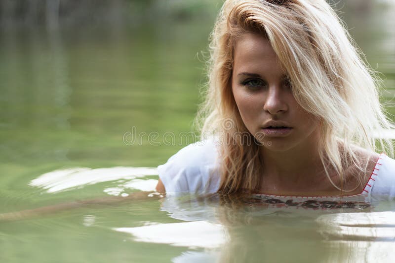 Women in water stock image. Image of blond, activity - 26087239
