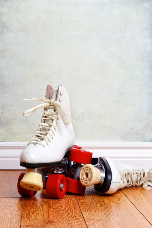 Women White Roller Skates on Wood Floor Stock Image - Image of ...