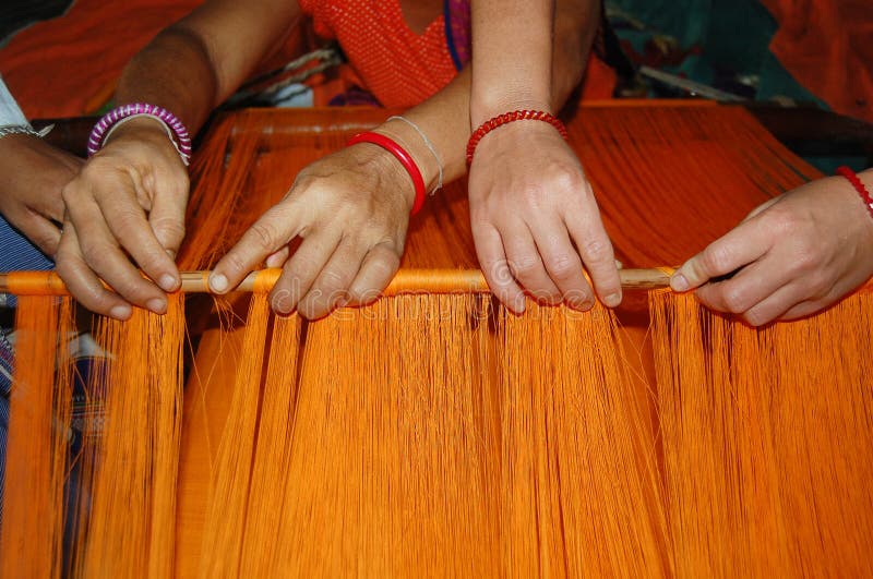 A Scene of Making Clothes by Hand Stock Photo - Image of building ...