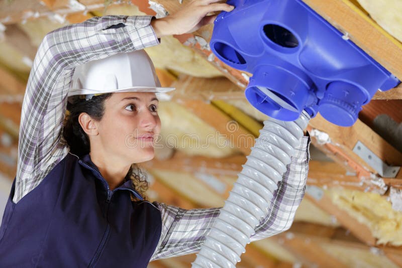 Women working pvc pipe stock photo. Image of tube, plant - 262849858