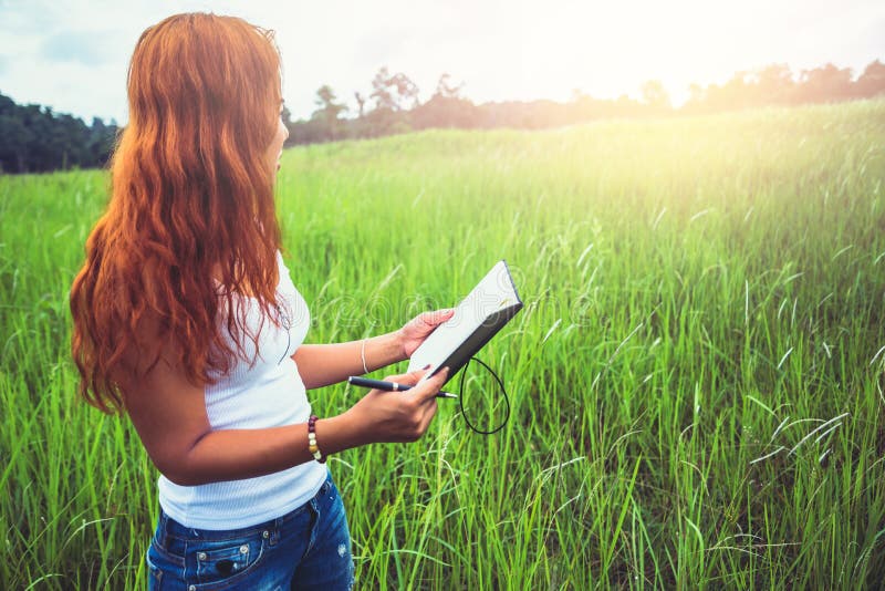 Women Write Notes Nature Trails, Mountains, Forests. Writer. Asian ...