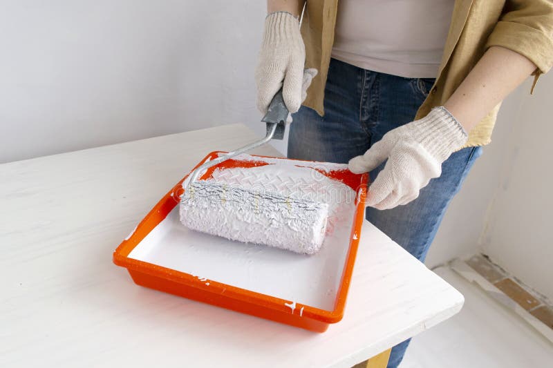 Womens Hands Using Paint Roller while Working Indoors Stock Photo ...