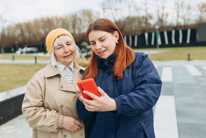 Womens Use Smartphone To Find What they are Interested in Outdoors ...