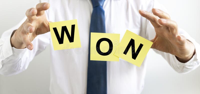 Won Word Written on Papers in Businessman Hands Stock Photo - Image of ...