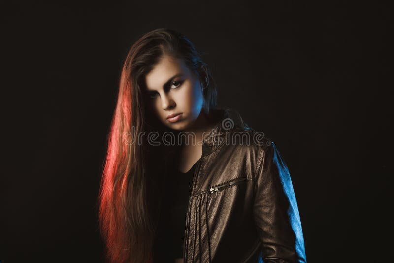 Wondeful Stylish Woman Posing at Studio with Red and Blue Light Stock ...