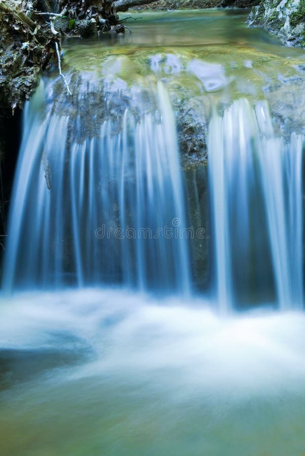 Wonderful blue waterfall stock image. Image of noise, green - 5958985