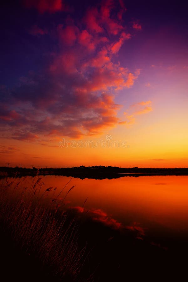 A Wonderful Dawn on the River with a Reflection in the Water. Vertical ...