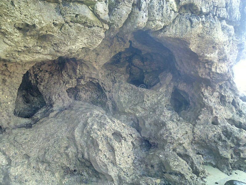 Holes in a Rock stock image. Image of rocj, wonderful - 139807877