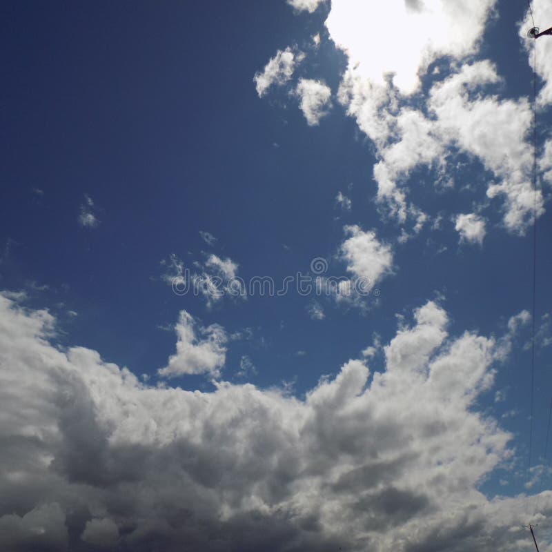 A Wonderful Sky with Sun and Clouds Stock Image - Image of house ...