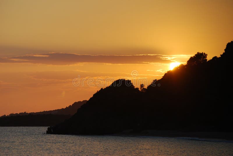 Wonderful sunset stock image. Image of hills, water, sunlight - 10418473