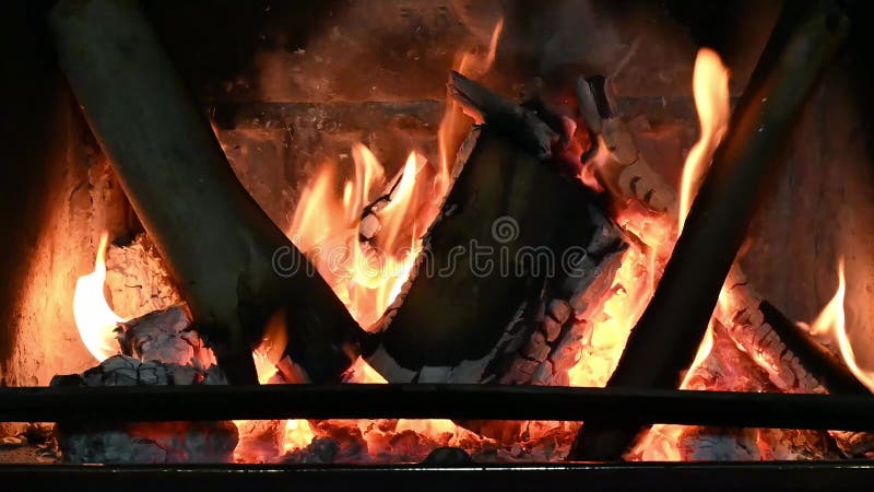 Wonderful warm log fire stock footage. Video of furnace - 297545266