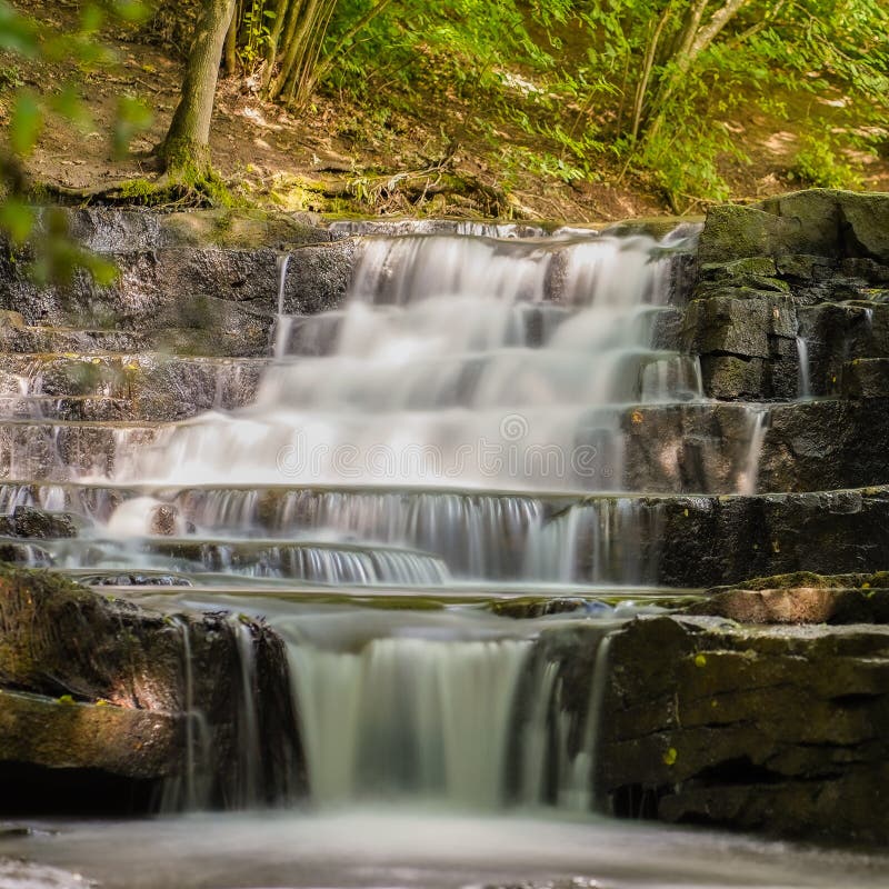 Wonderous Waterfall in Rocks in a Fall Forest Stock Image - Image of ...