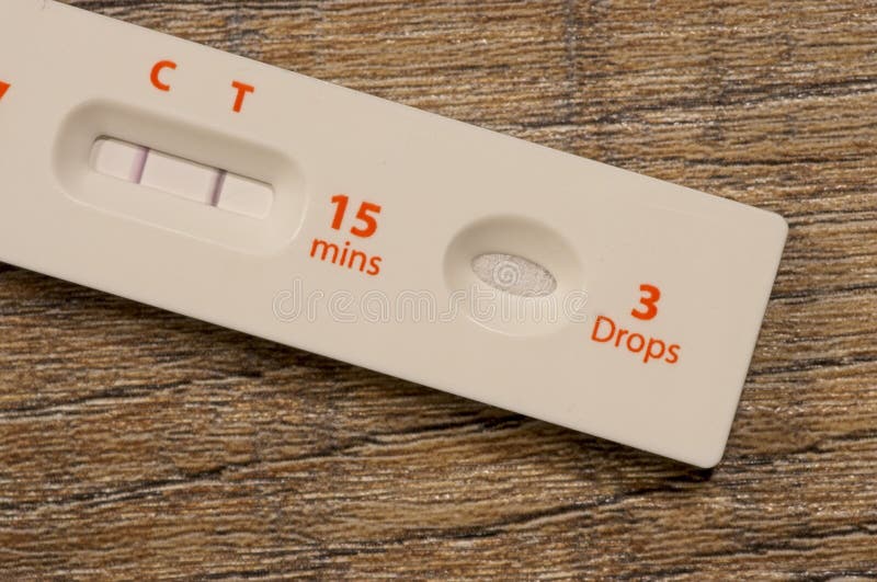 Wood Backdrop with a Positive COVID-19 Test Stock Photo - Image of ...