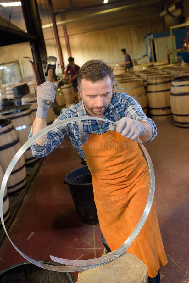 Wood Barrels Production Cooper Using Hammer and Tools in Workshop Stock ...